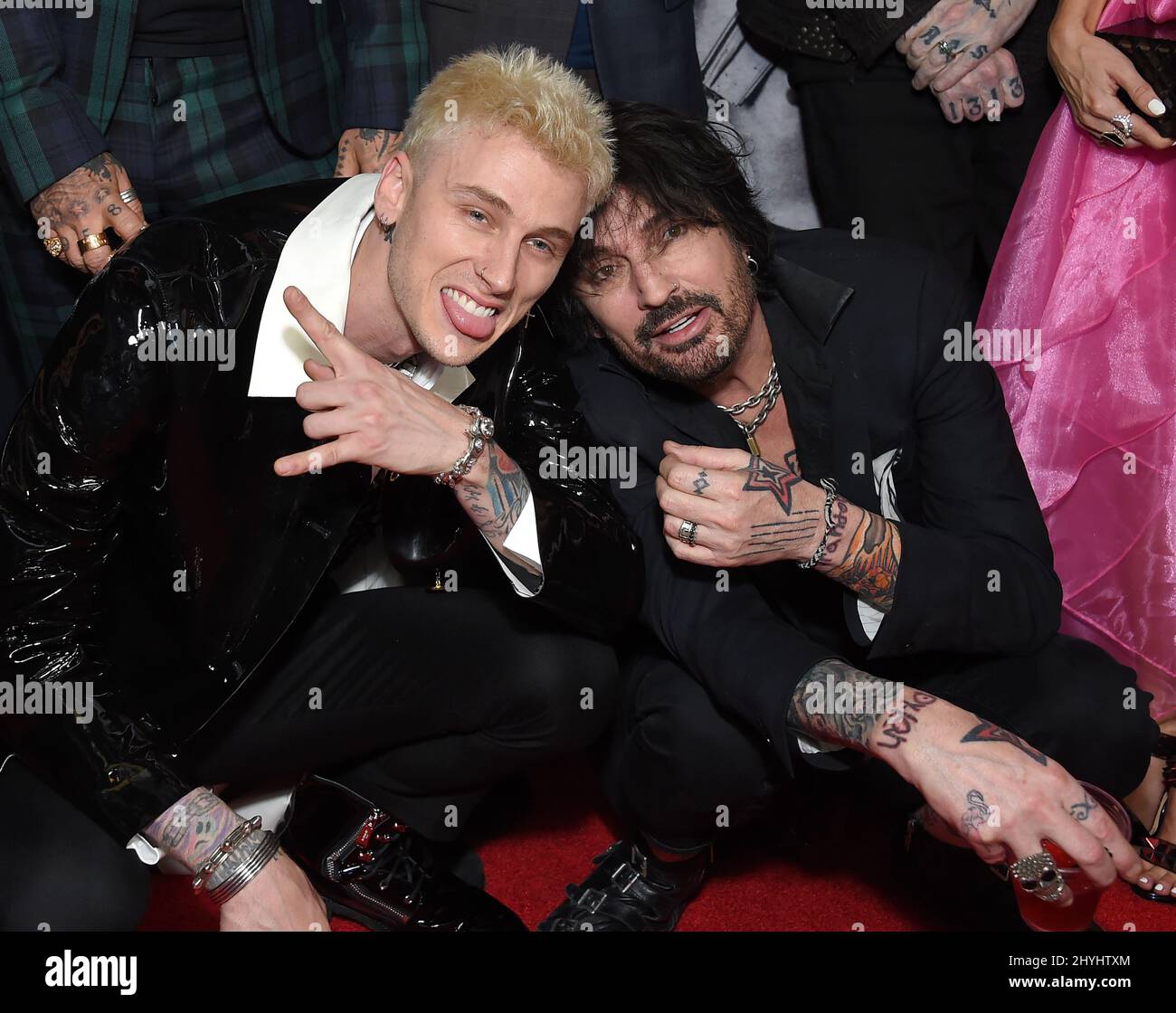 Machine Gun Kelly and Tommy Lee at Netflix's "The Dirt" world premiere ...