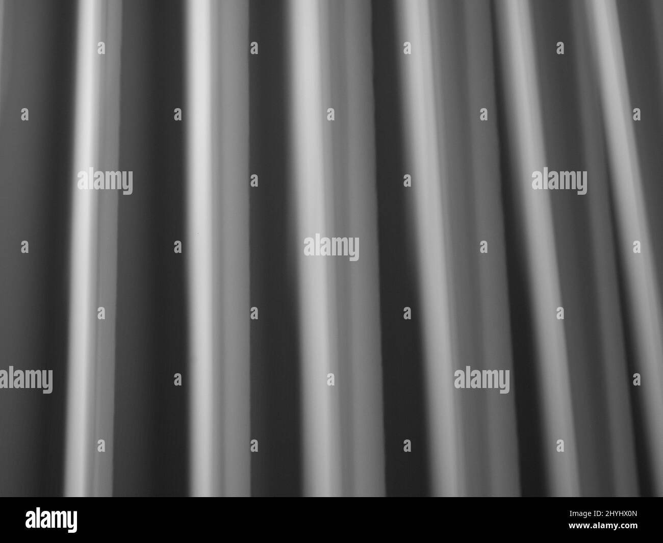 Abstract white lines background. Blurry white lines converging on top ...