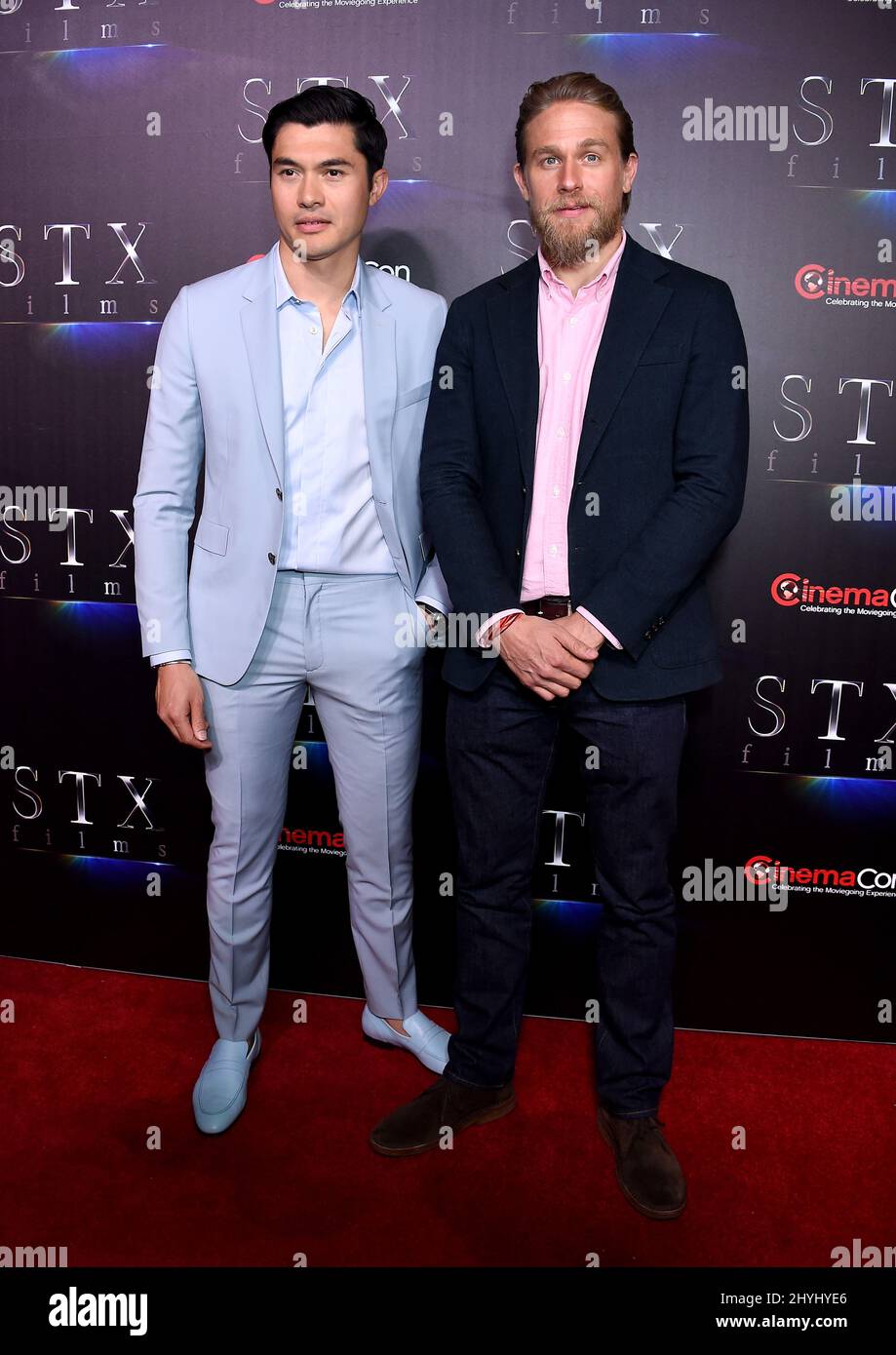 Henry Golding and Charlie Hunnam at STXfilms "The State of the Industry ...