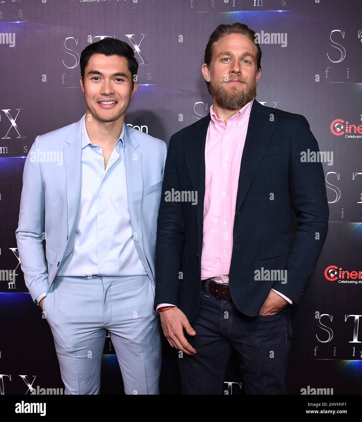Henry Golding and Charlie Hunnam at STXfilms "The State of the Industry ...