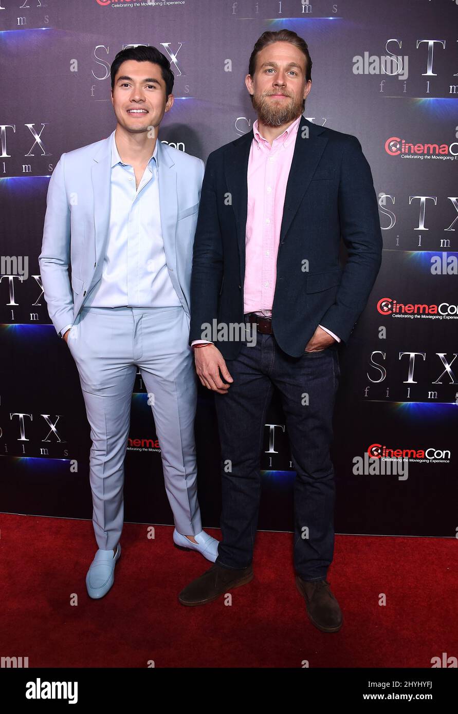 Henry Golding and Charlie Hunnam at STXfilms "The State of the Industry ...