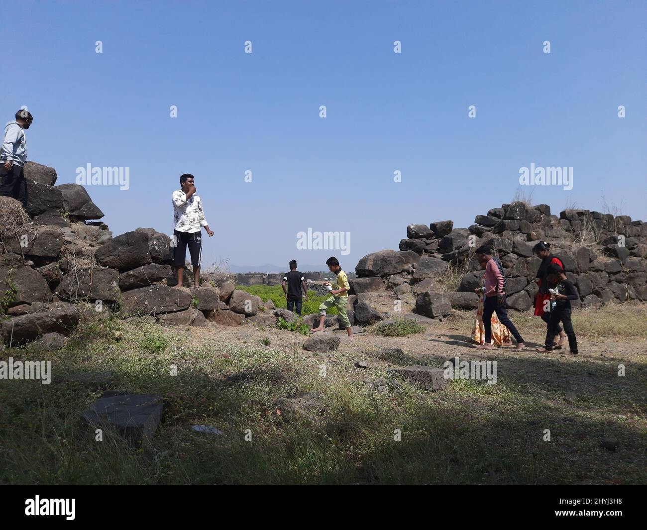 People or tourist visiting ruins of Kolaba Fort in a sea at Alibag ...