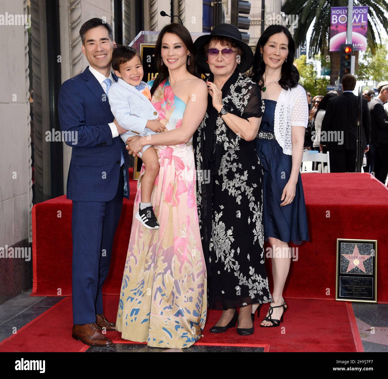 Lucy Liu is joined by John Liu, Rockwell Lloyd Liu, Cecilia Liu and ...
