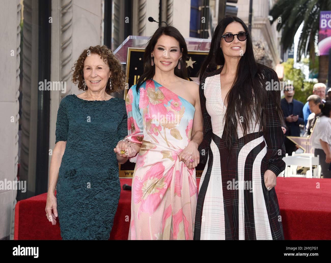 Lucy Liu is joined by Demi Moore and Rhea Perlman at her Hollywood Walk ...