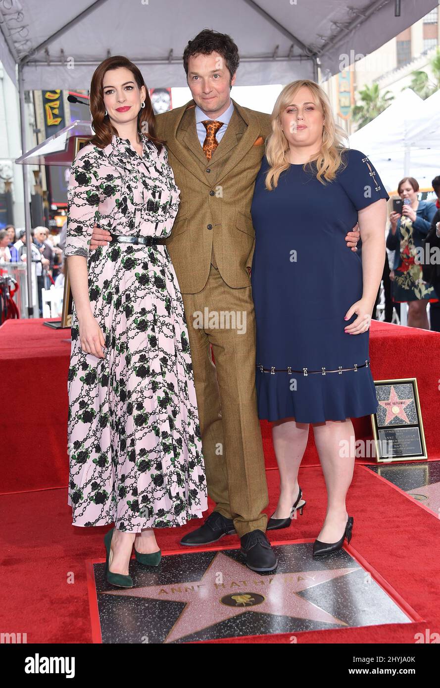 Anne Hathaway, Chris Addison and Rebel Wilson during a Hollywood Walk ...