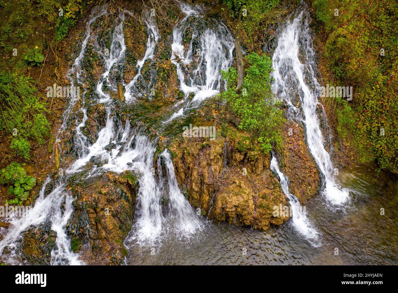 Waterfall in nature. Mountain cascade river waterfall. Aerial drone ...