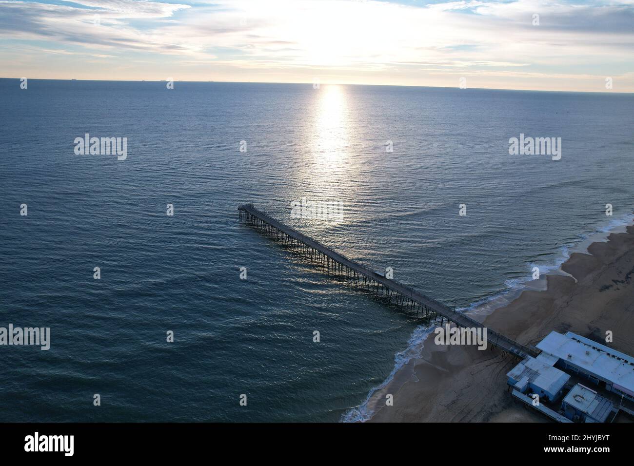 Scenic aerial view of the sea and a pier Stock Photo - Alamy