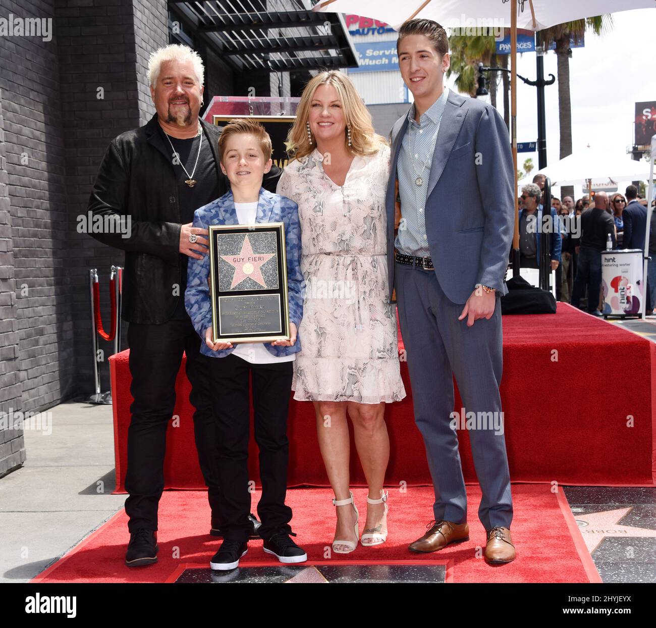 Guy Fieri, Lori Fieri, Hunter Fieri and Ryder Fieri at his Hollywood ...
