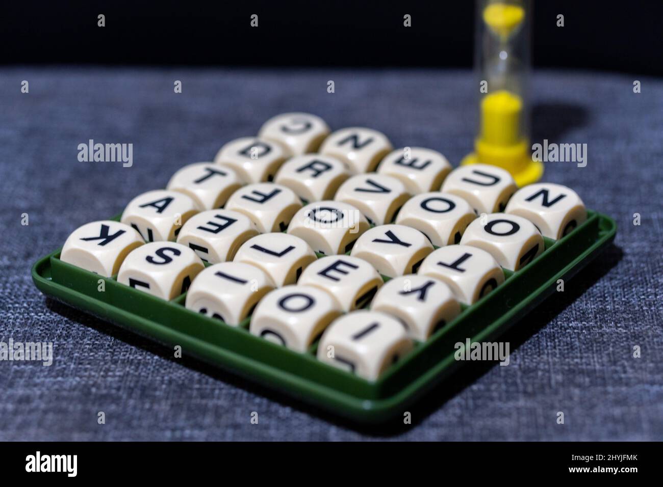 Set of word cubes in a green frame for playing scrabble Stock Photo - Alamy