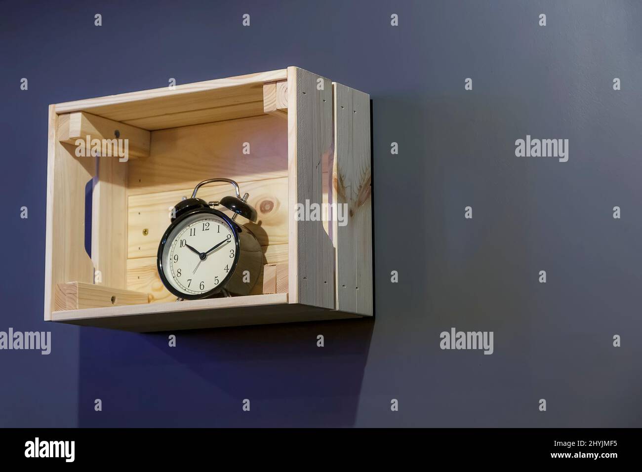 Wall vintage decoration. Crate with vintage clock Stock Photo - Alamy