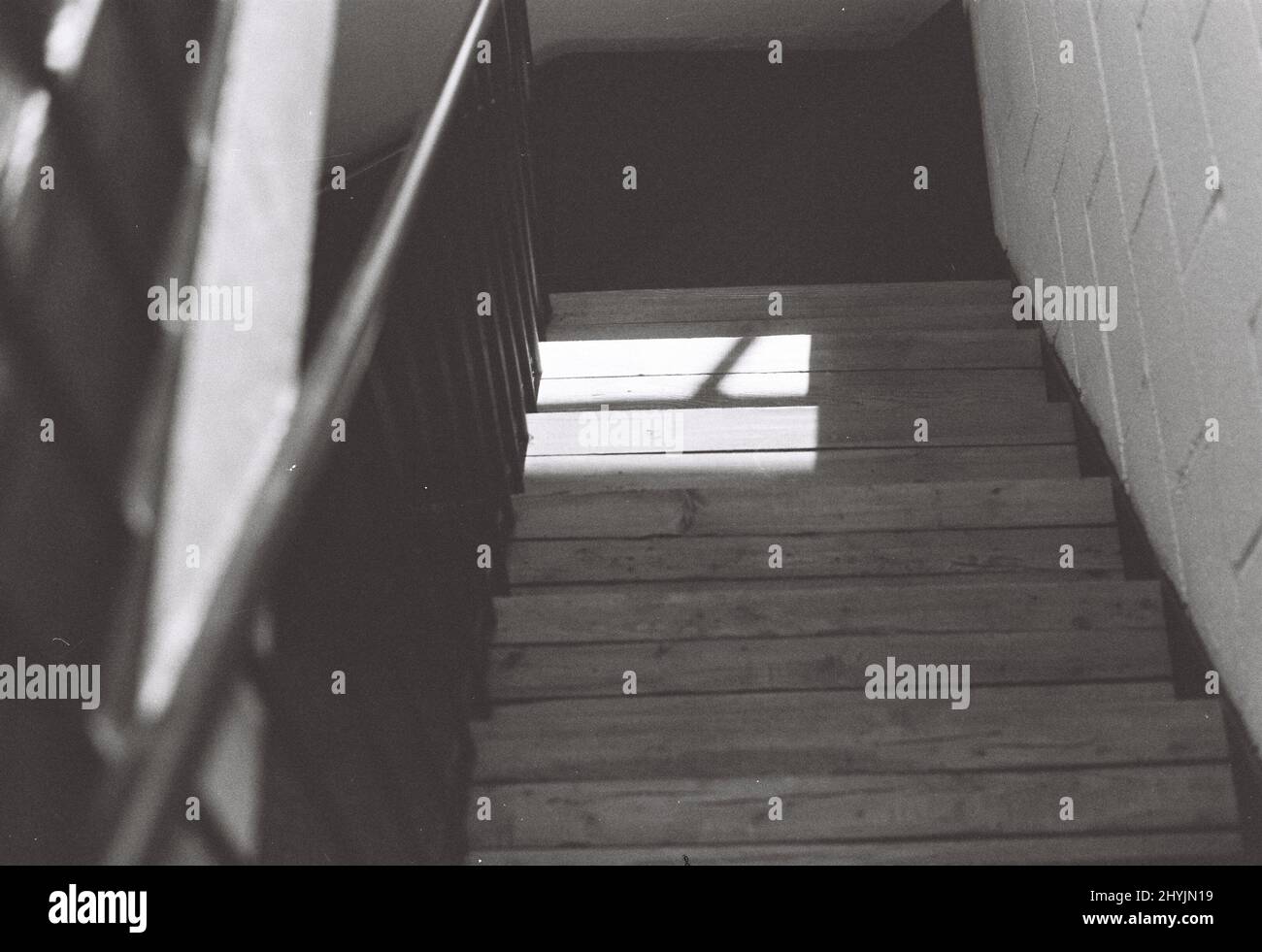 Grayscale shot of stairs inside a building Stock Photo - Alamy