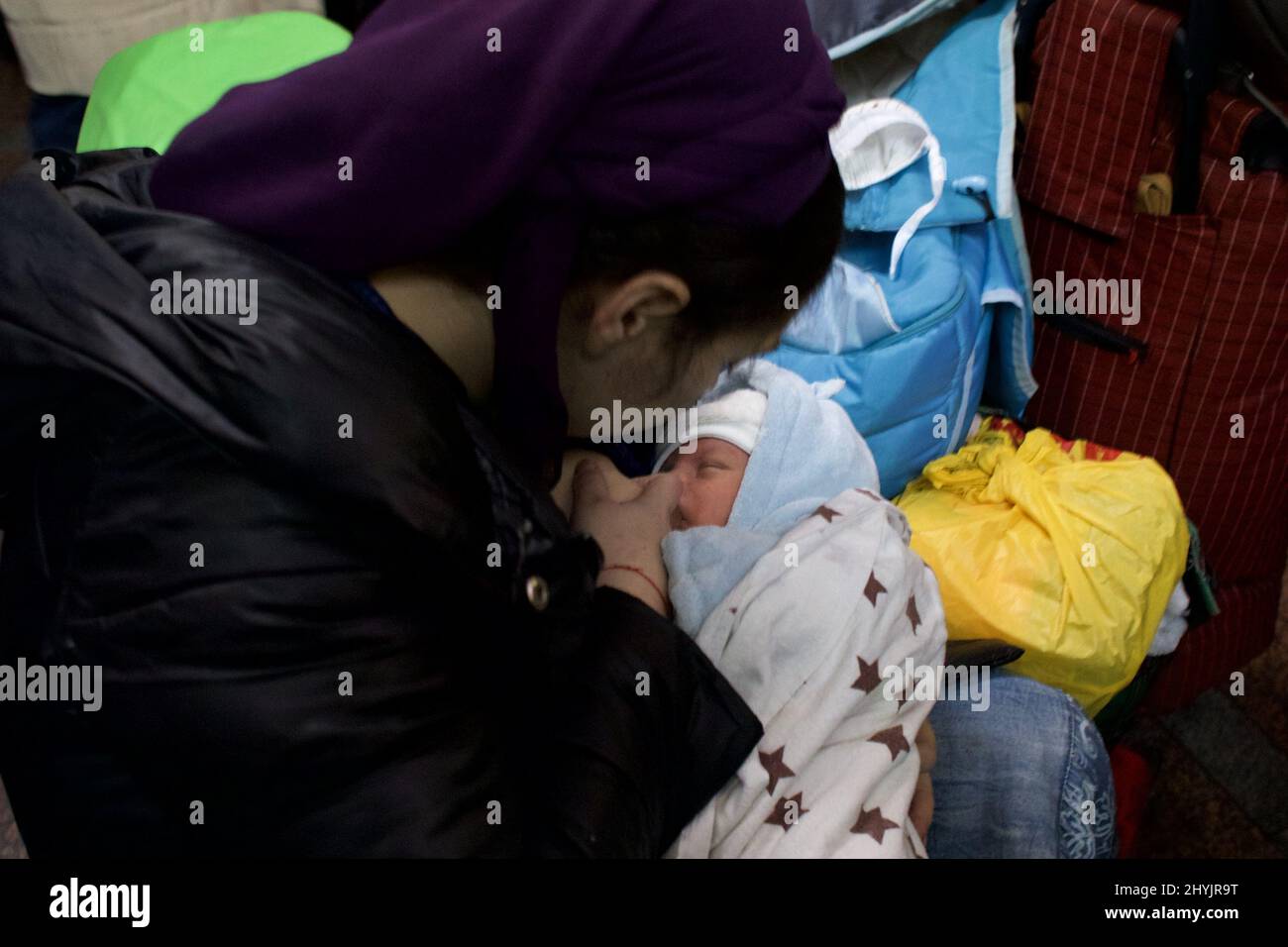2022-03-04 10:13:29 Lviv, Ukraine. A Woman is breastfeeding her child ...