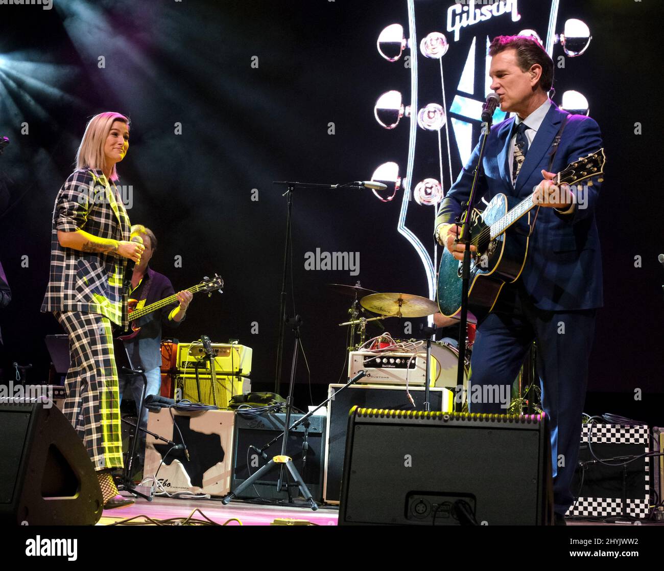 Cassadee Pope and Chris Isaak onstage at Gibson's Summer NAMM Jam ...