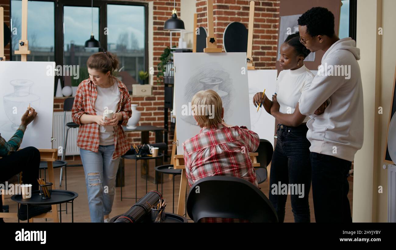 Elder person attending art class hi-res stock photography and images ...