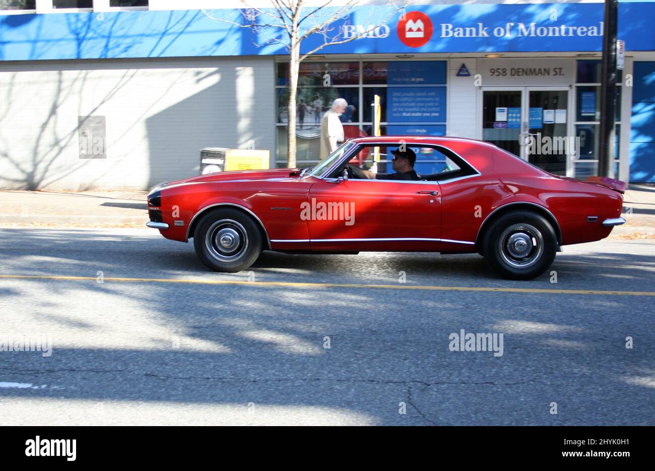 Red classic American car in the street of Vancouver, British Columbia ...