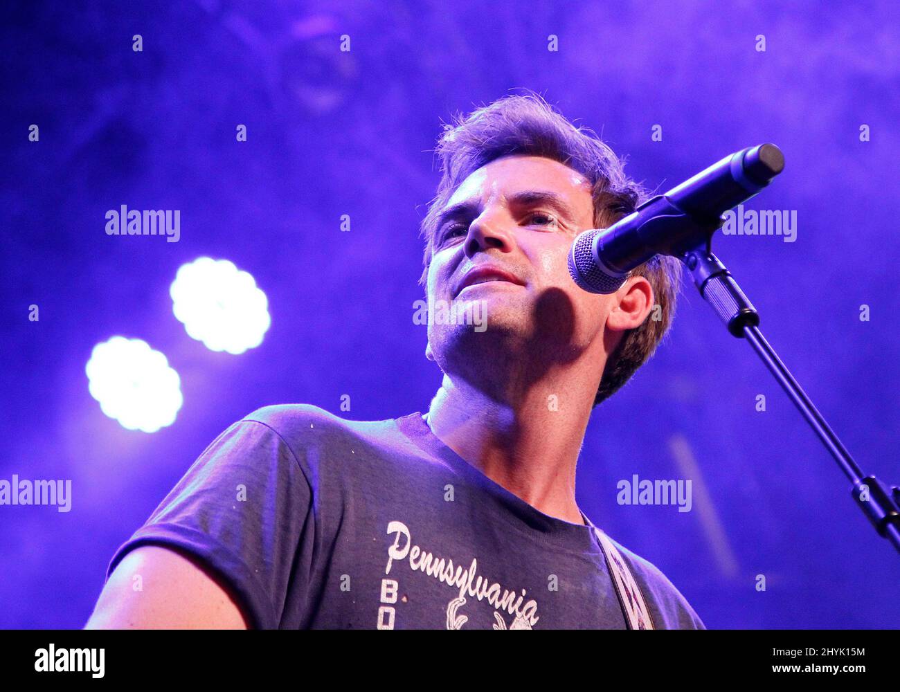 Tyler Hilton performing onstage at the Pop 2000 Tour concert held at ...