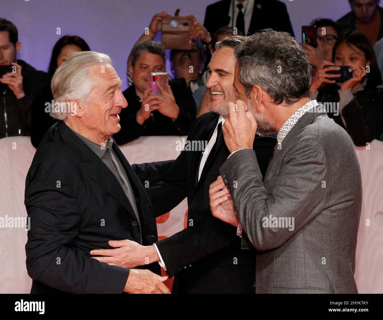 Robert De Niro, Joaquin Phoenix and Todd Phillips arrives at the ...