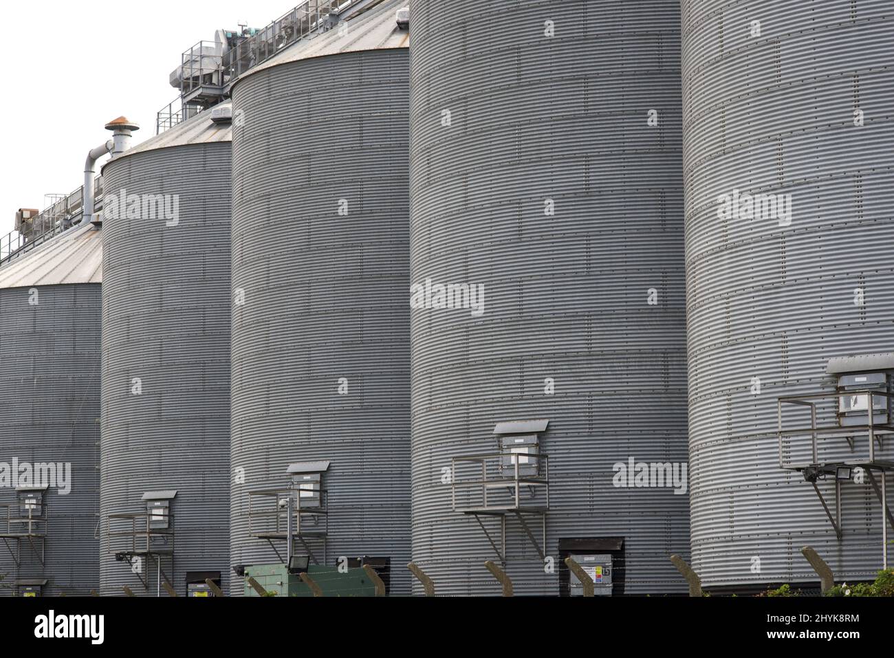 Closeup of food silos in a daylight Stock Photo - Alamy
