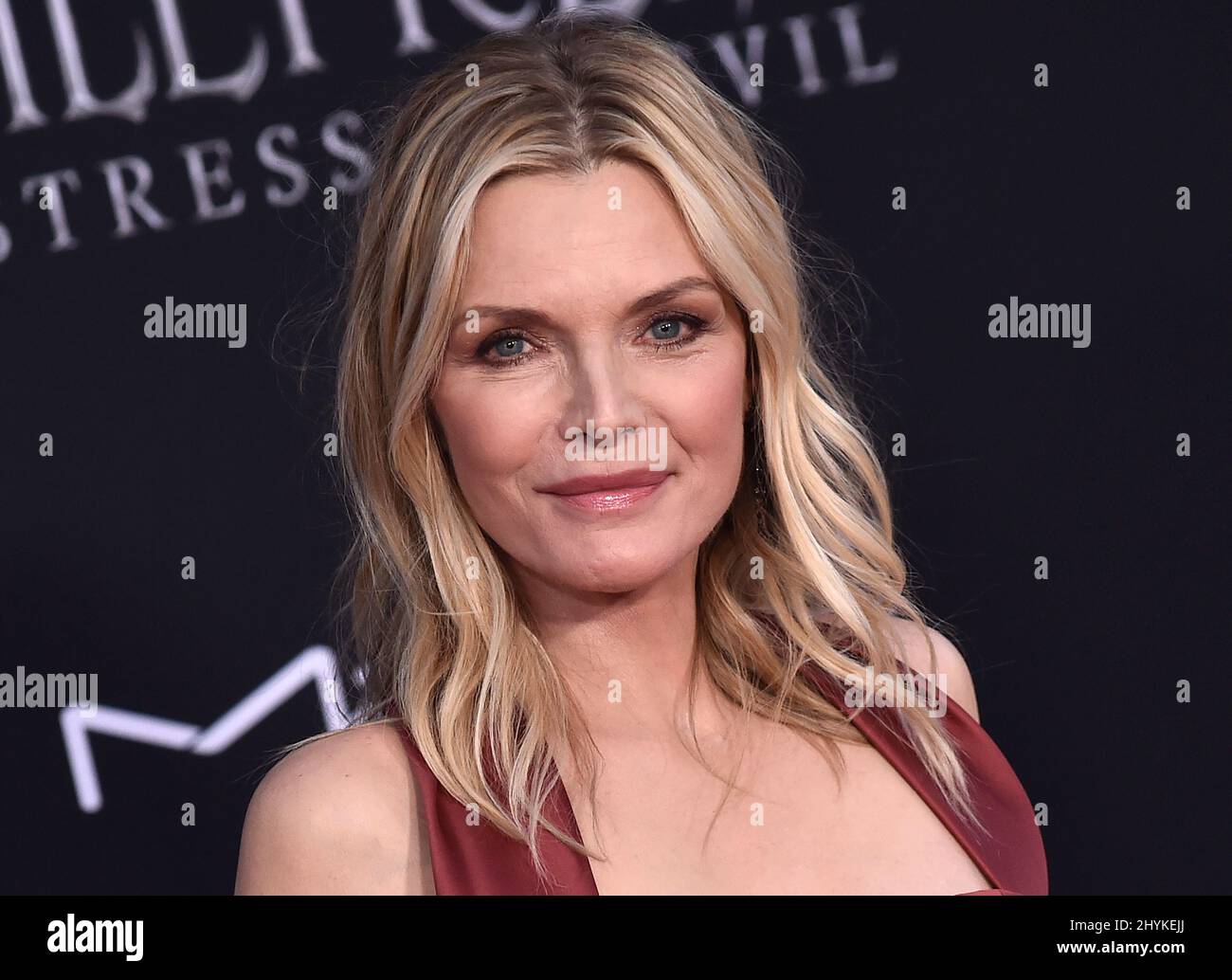 Michelle Pfeiffer at the world premiere of "Maleficent: Mistress of ...