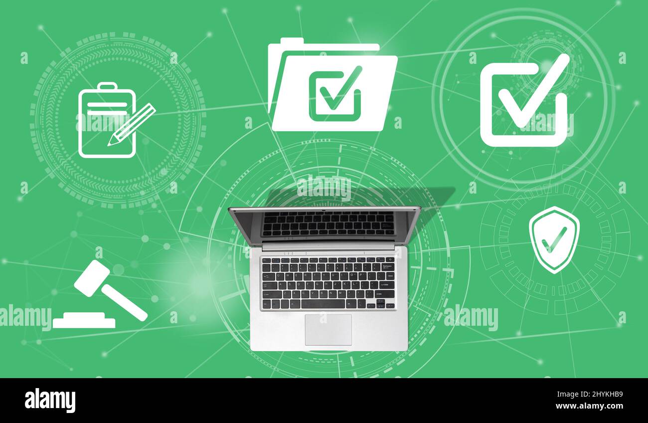 Top view of laptop with symbol of compliance concept Stock Photo - Alamy