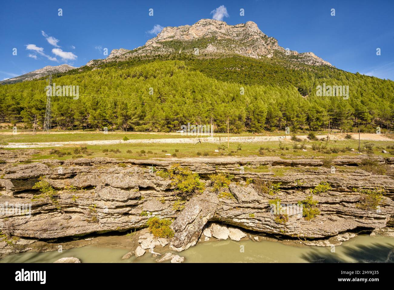 Beautiful mountain valley with gentle hills and river Stock Photo - Alamy