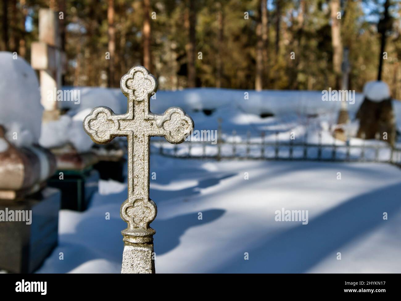 Ornate cross on the cemetery fence Stock Photo - Alamy
