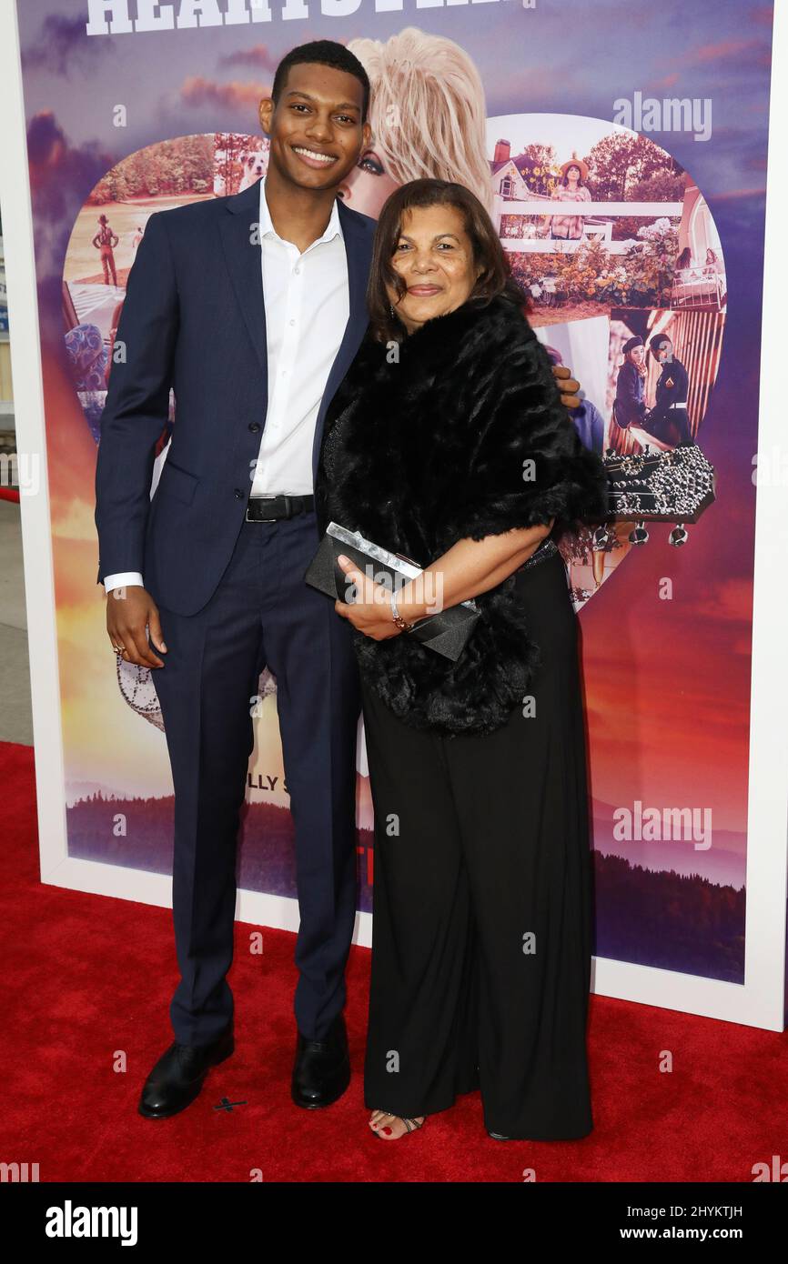 Shane McGhie and mother attends the premiere of Dolly Parton's ...