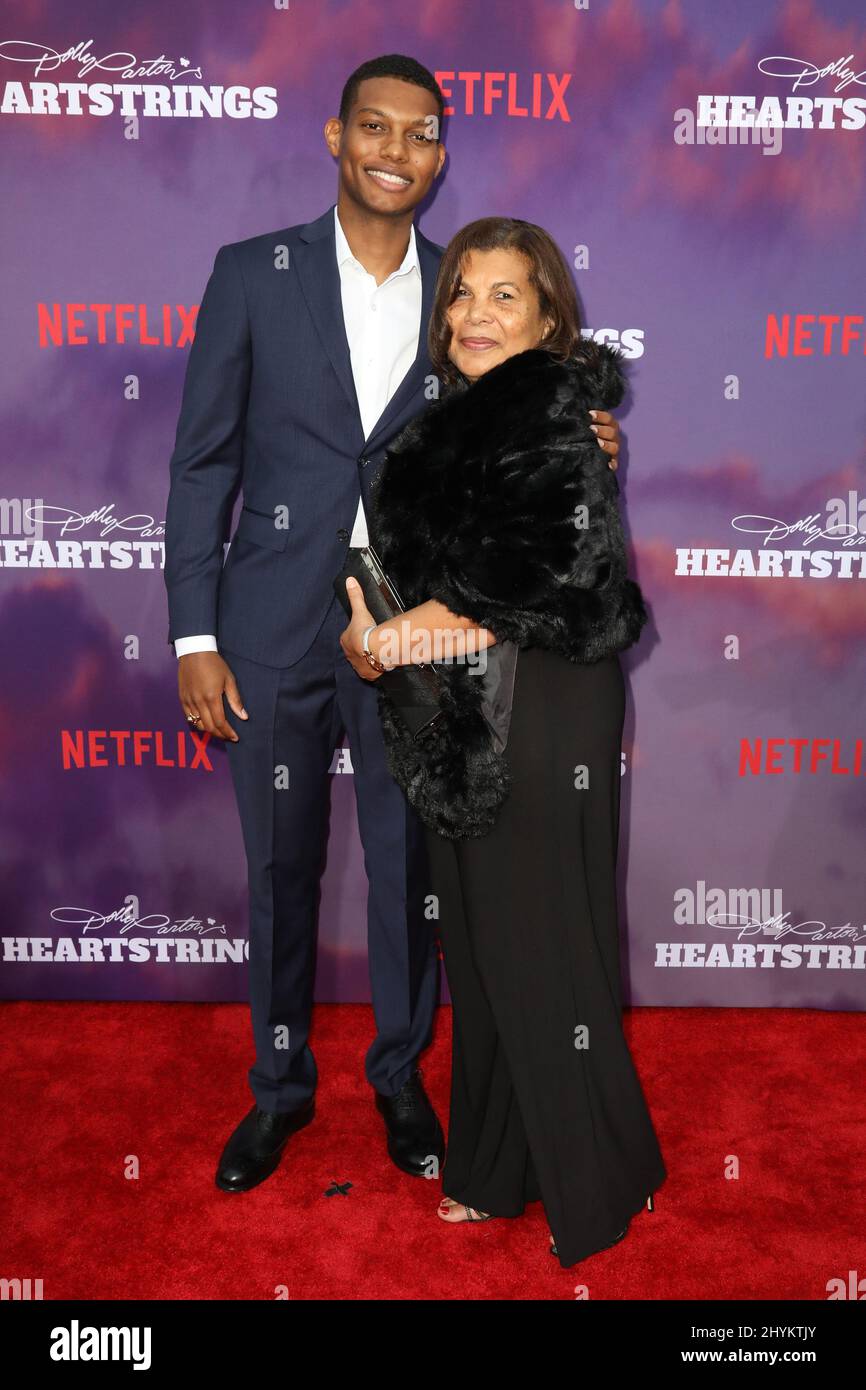 Shane McGhie and mother attends the premiere of Dolly Parton's ...