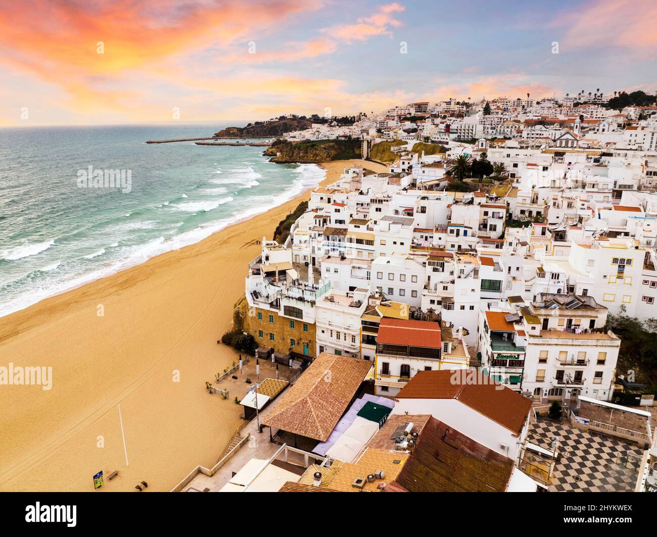Aerial view of whitewashed architecture of Albufeira by the Atlantic ...