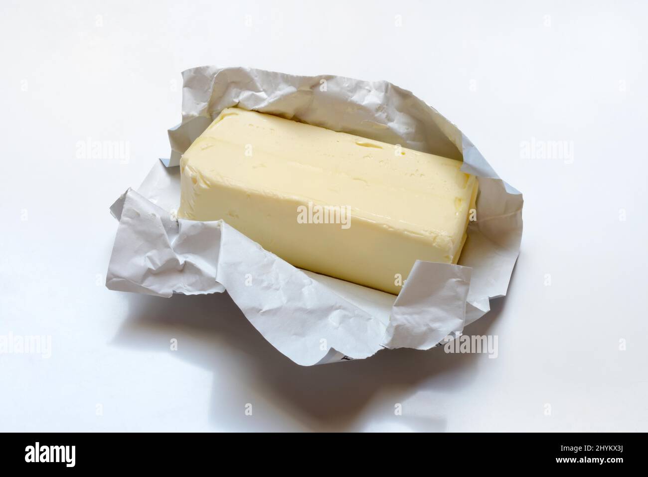 Butter with opened packaging Stock Photo - Alamy