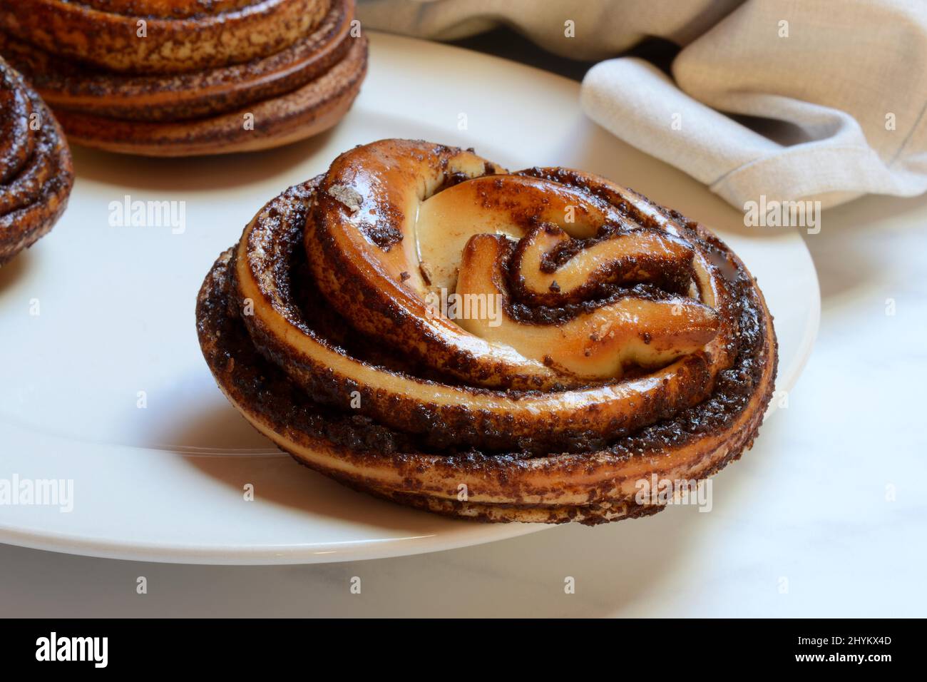 Cinnamon biscuits, cinnamon bun, cinnamon button on plate Stock Photo ...