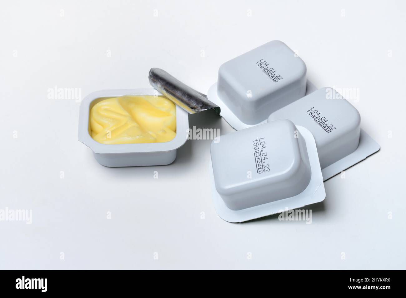 Butter in breakfast portion, portion pack Stock Photo - Alamy