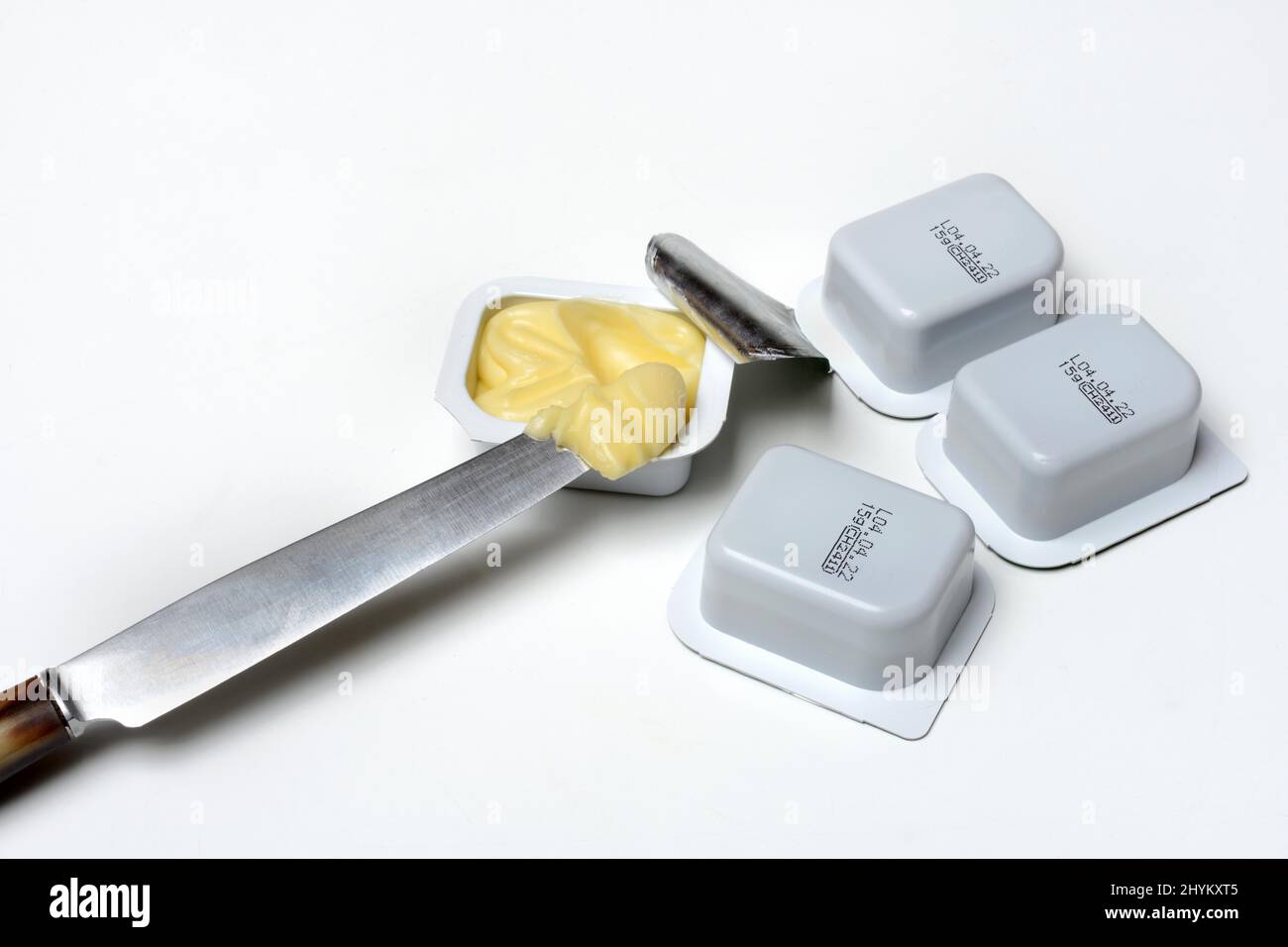 Butter in breakfast portion, portion pack Stock Photo - Alamy