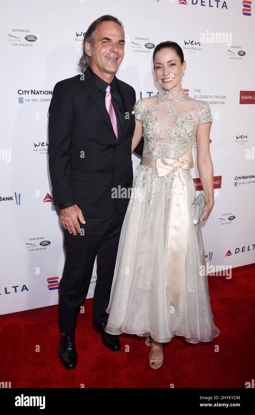 Emmanuelle Vaugier and Vince Calandra attending the Elizabeth Taylor ...