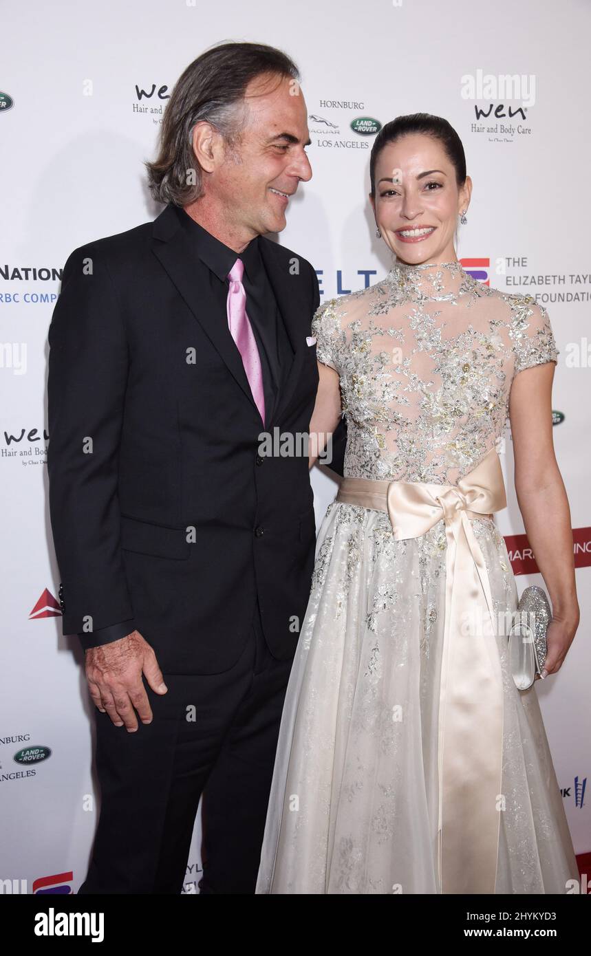 Emmanuelle Vaugier and Vince Calandra attending the Elizabeth Taylor ...