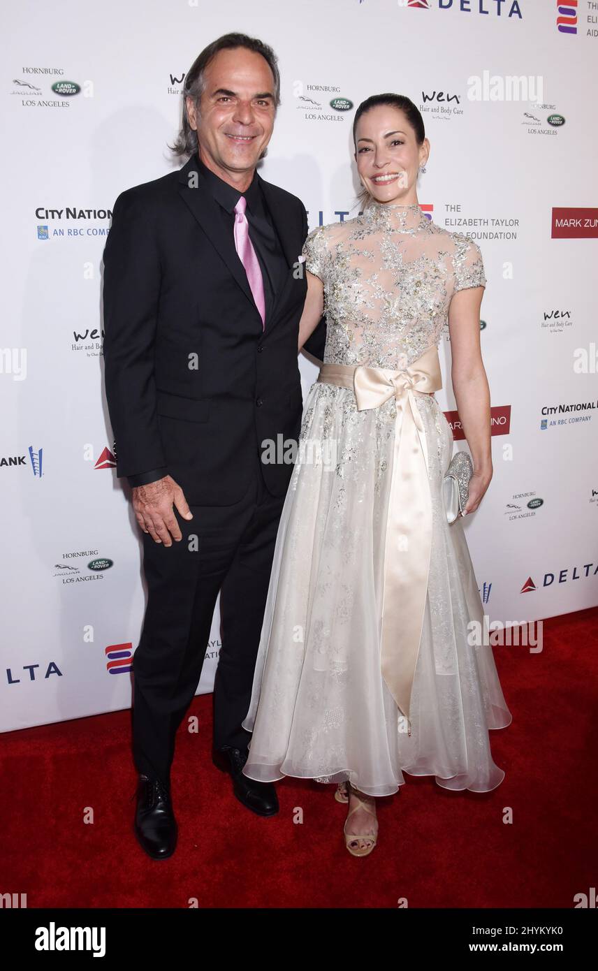 Emmanuelle Vaugier and Vince Calandra attending the Elizabeth Taylor ...