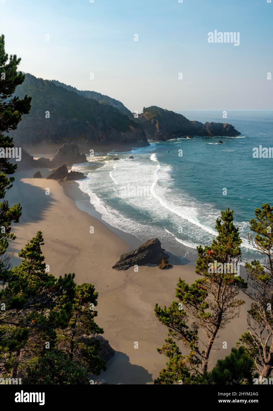 Sandy beach beach by the sea, coastal landscape with rugged rocks ...