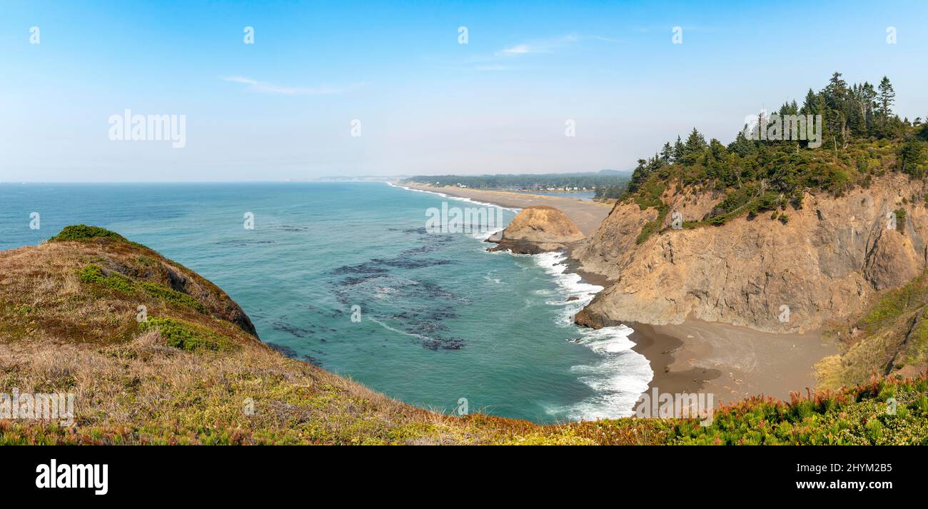 Sandy beach beach and rocky coast, coastal landscape with rugged cliffs ...