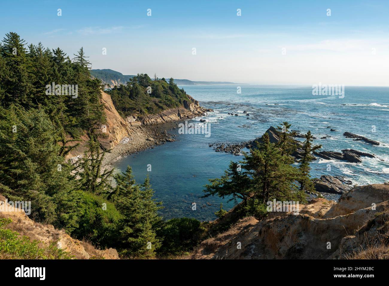 Sandy beach beach and rocky coast, coastal landscape with rugged cliffs ...