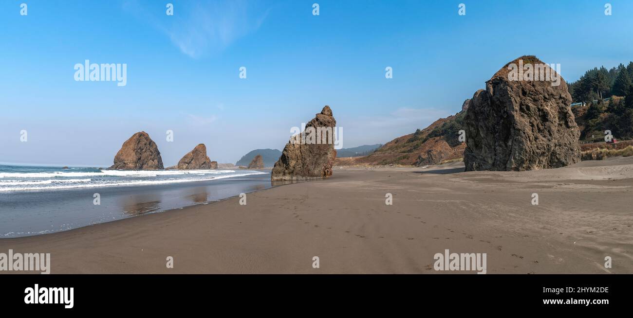 Sandy beach beach with sea and big rocks, coastal landscape, Pistol ...