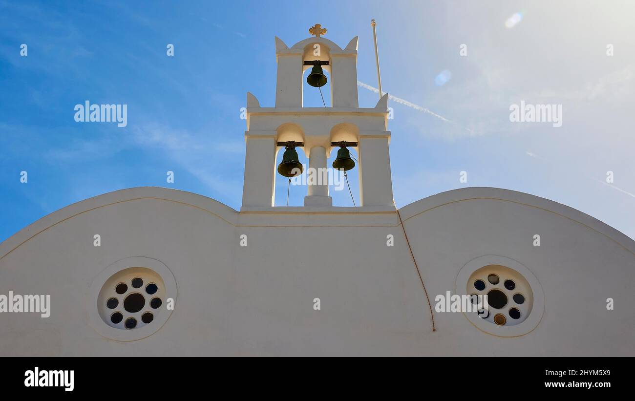 Morning light, back light, sunbeam, roof and bell tower of the church ...