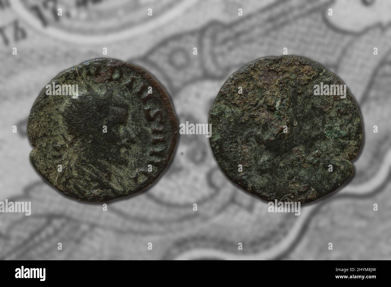 ancient Roman coins with the image of a human head with antique ...
