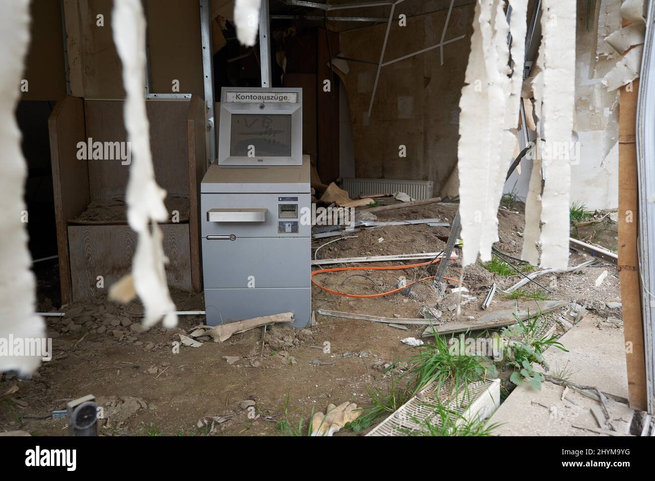 Flood disaster, bank statement printer in a bank branch destroyed by ...