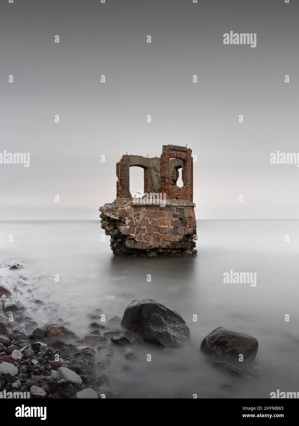 Old tide gauge house on the beach near Kap Arkona on the German island ...