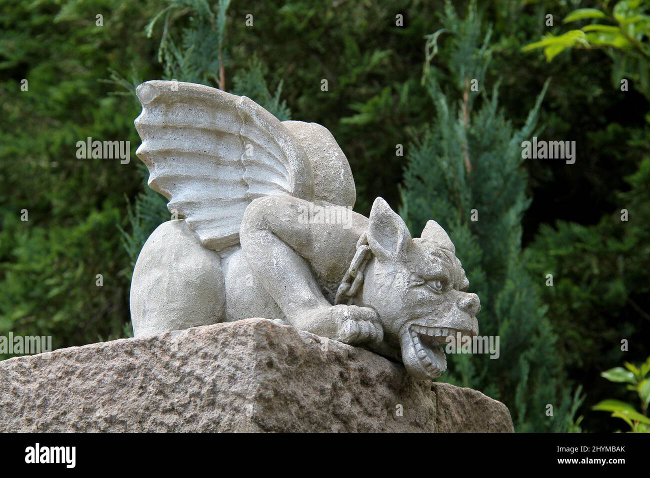 A Winged Stone Gargoyle on a Gateway Pillar Stock Photo - Alamy