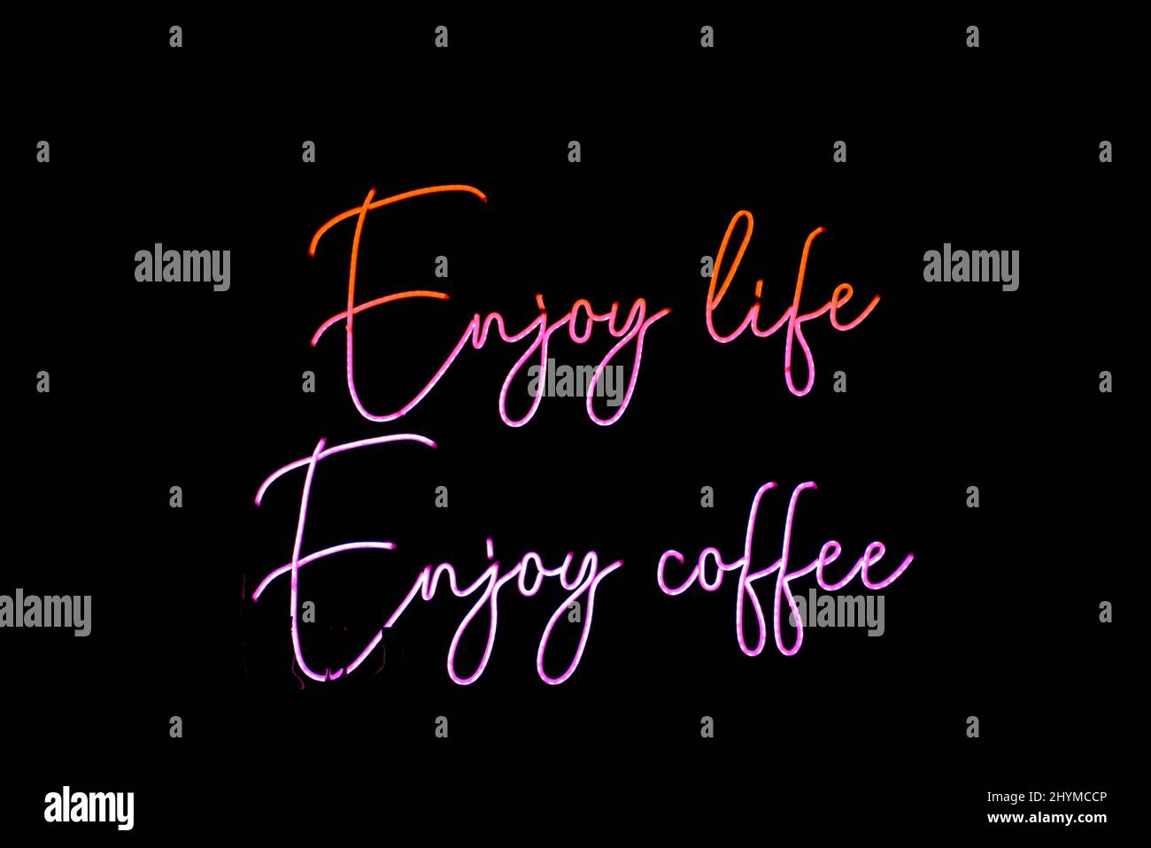 Neon light words, enjoy life, enjoy coffee Stock Photo - Alamy