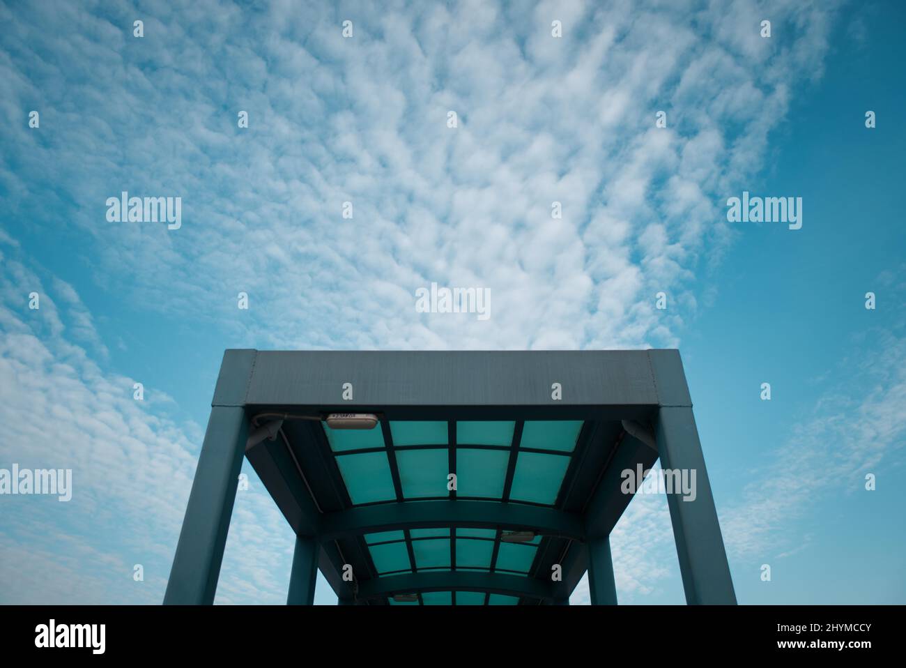 Dramatic blue sky and skywalk Stock Photo - Alamy
