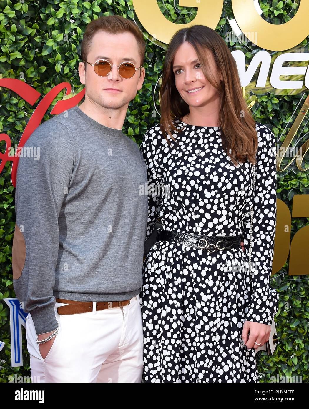 Taron Eggerton and Emily Robinson at the 7th Annual Gold Meets Golden ...