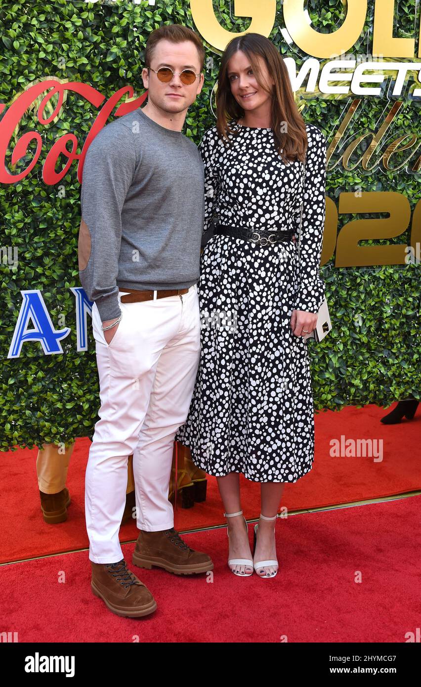 Taron Eggerton and Emily Robinson at the 7th Annual Gold Meets Golden ...