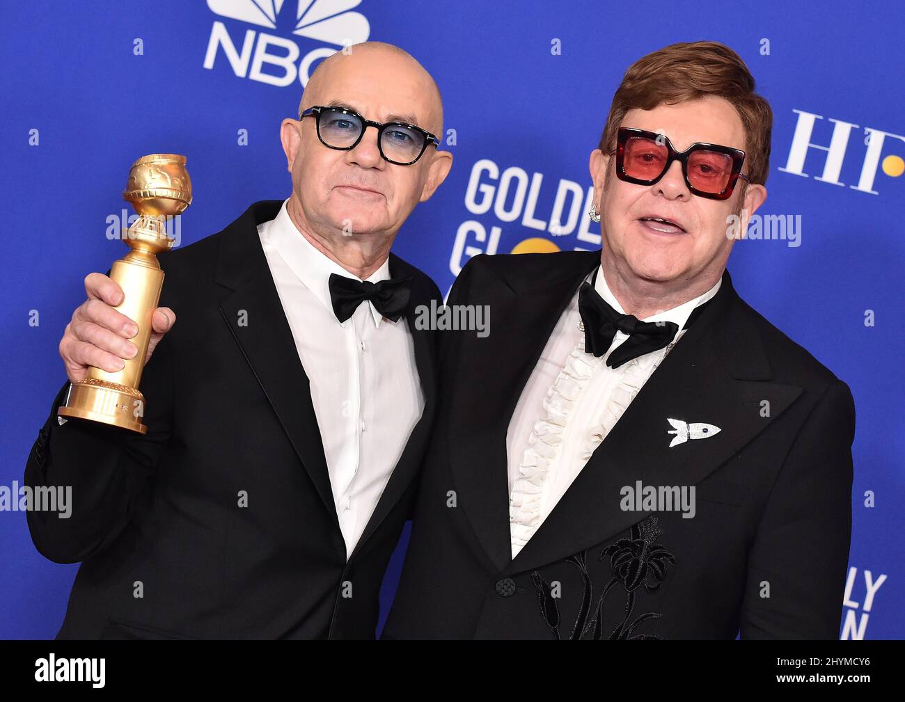 Bernie Taupin and Elton John in the press room at the 2020 Golden Globe ...